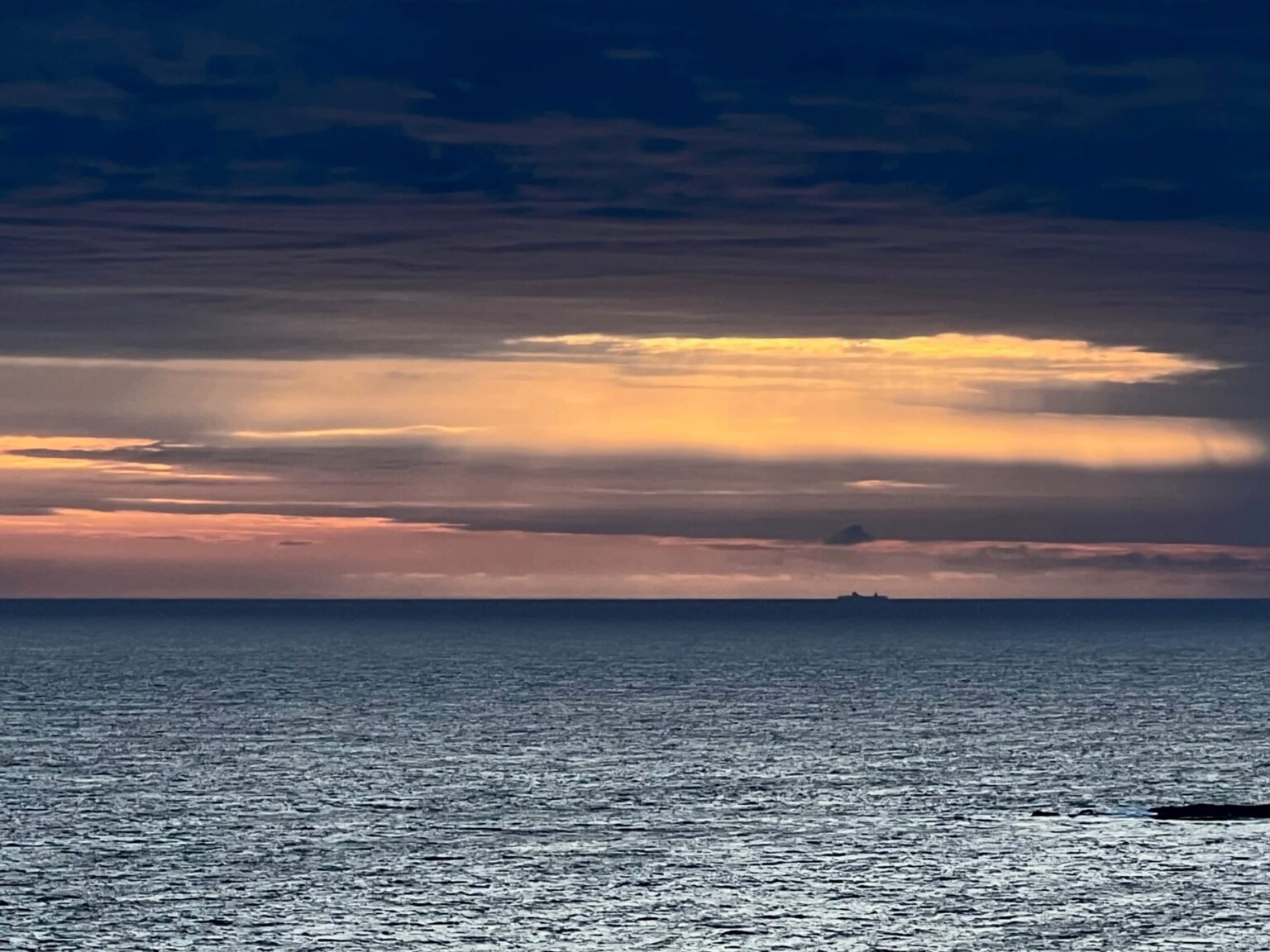 A beautiful sunset with a ship on the horizon, as photographed by Shari ...